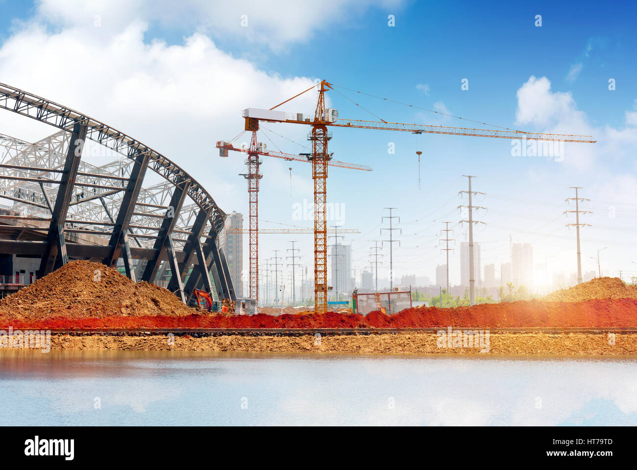 Construction sites, steel structures and cranes under the blue sky ...