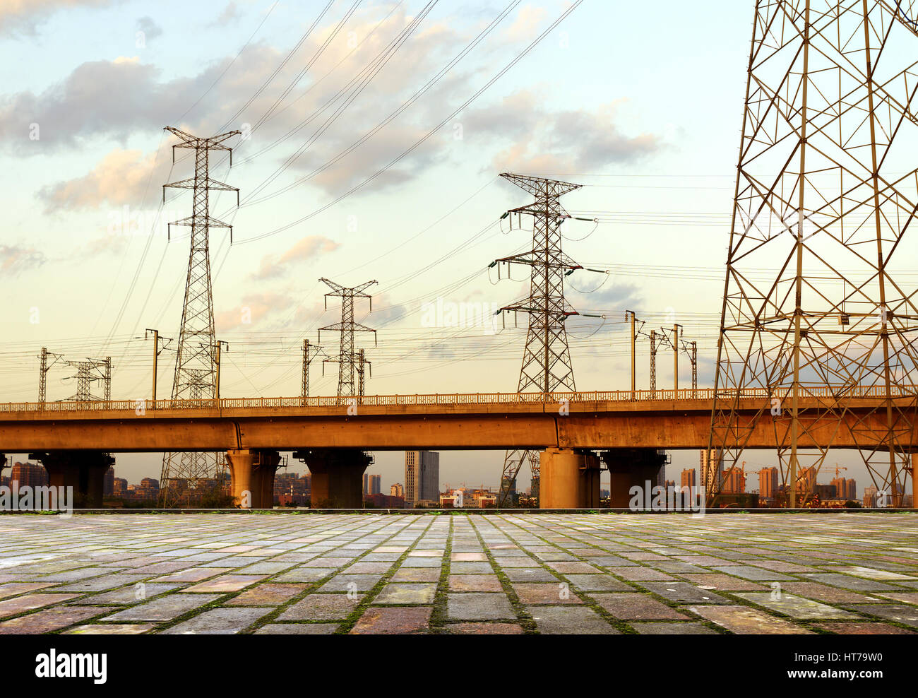 Under the background of the evening sky, pylons and high-speed rail ...