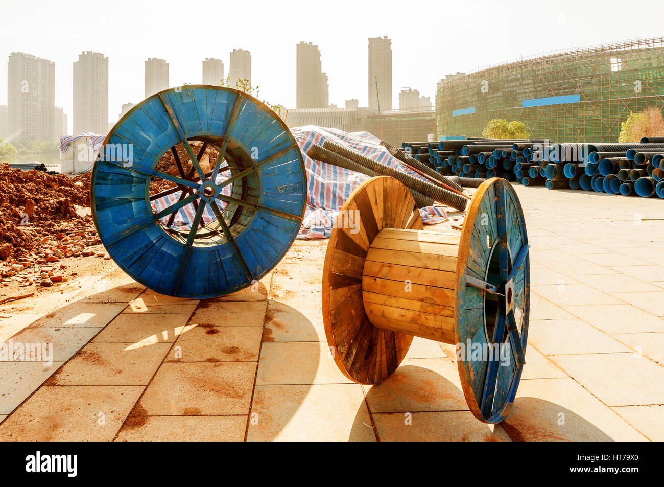 Construction sites and discarded cable reels Stock Photo - Alamy