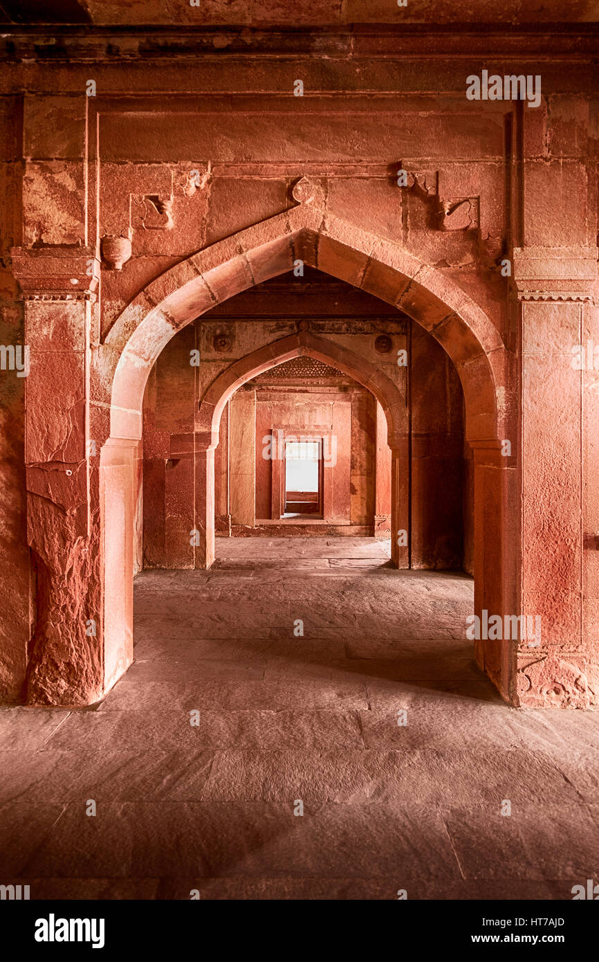 A stone arch of red sandstone leads out of the Emperor's bed chamber to ...