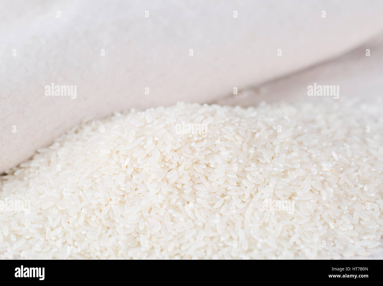 Rice grains closeup on the table Stock Photo - Alamy