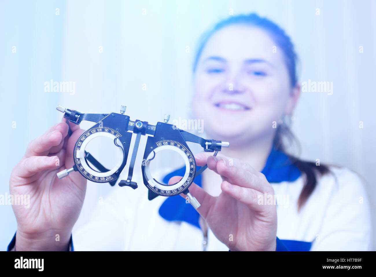 Close-up of optometrist holding messbrille glasses in ophthalmology ...