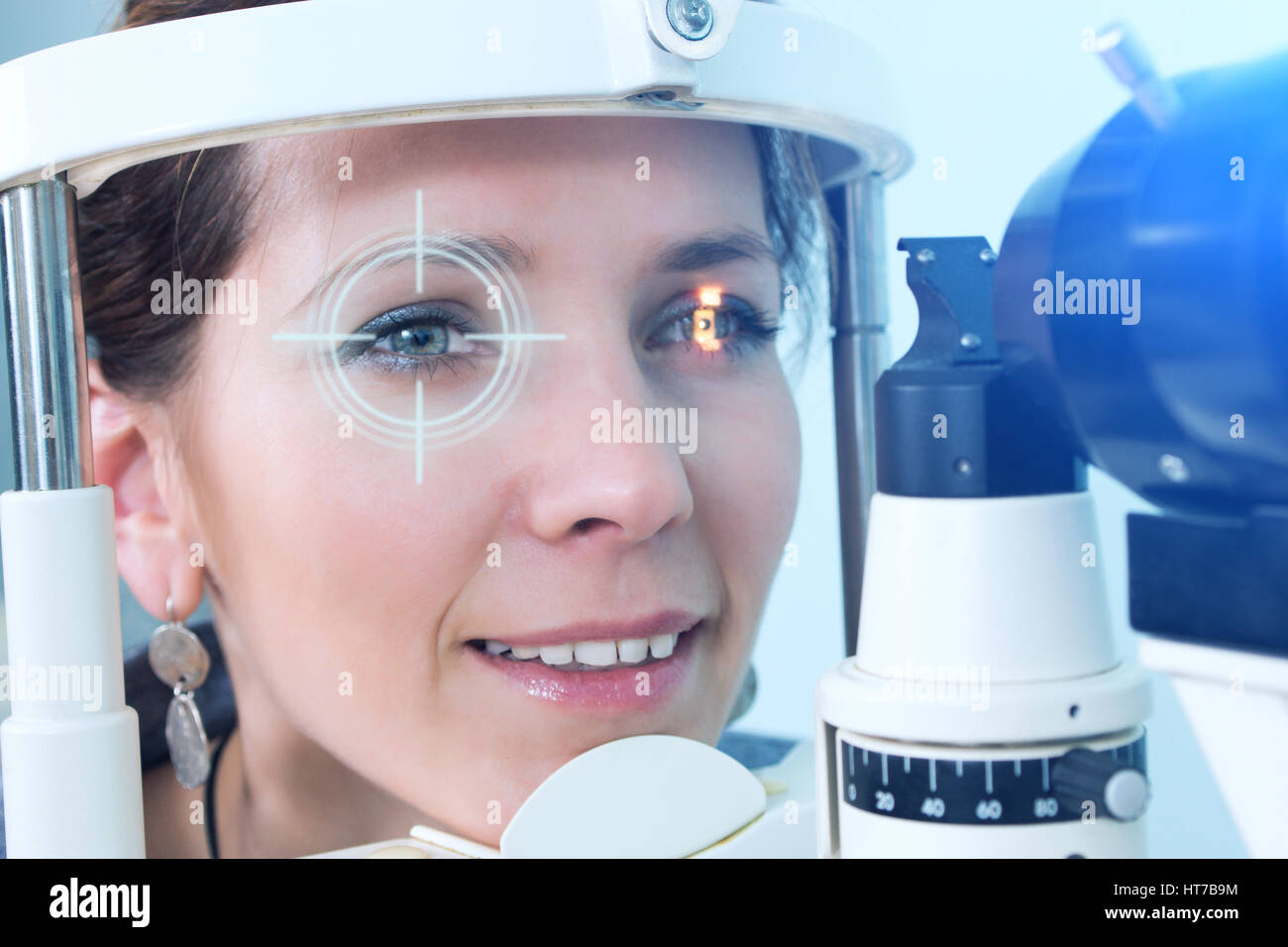 Checking eyesight in a clinic of the future, young girl. Ophthalmology ...