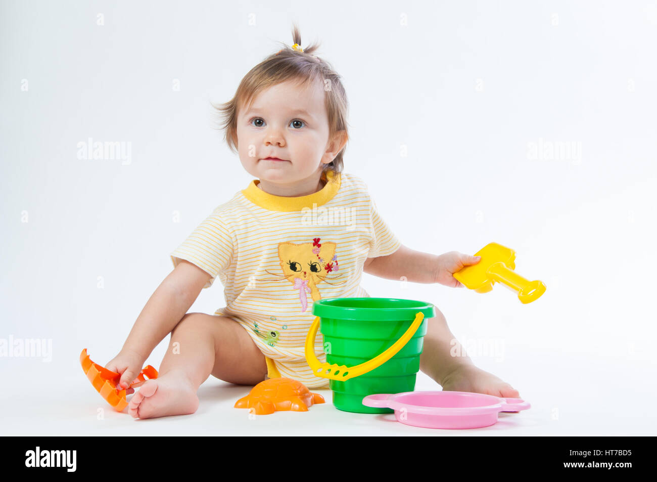 Cute baby with bucket and spade isolated on white background Stock ...