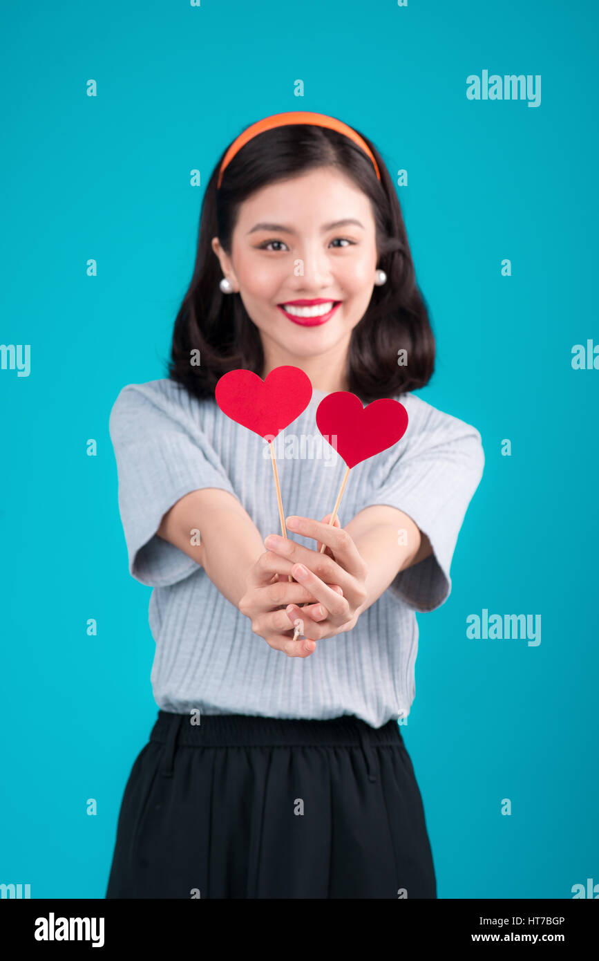 Young woman hand over heart hi-res stock photography and images - Alamy