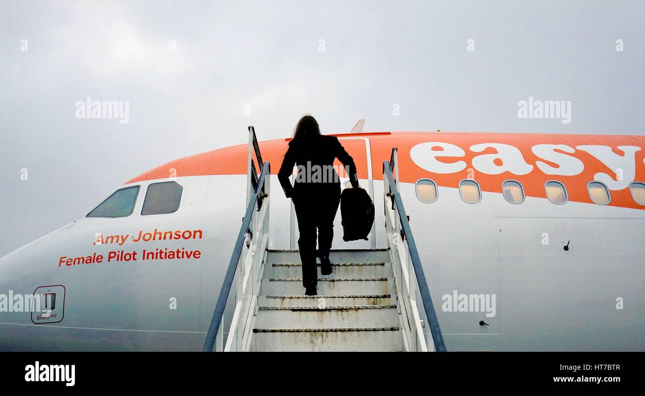 Captain Kate McWilliams boards her aeroplane before an EasyJet flight ...