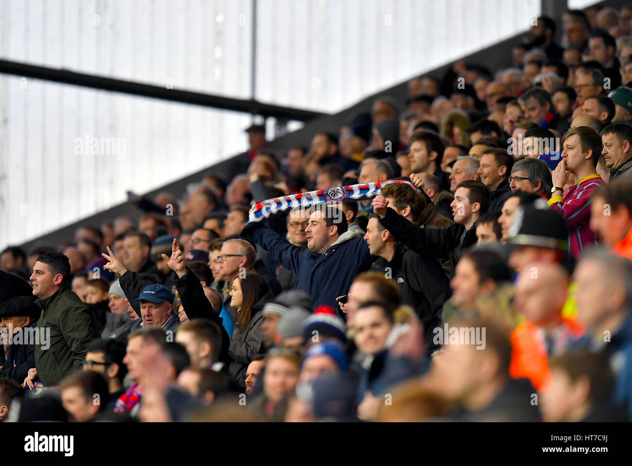 Fans in the stands Stock Photo - Alamy