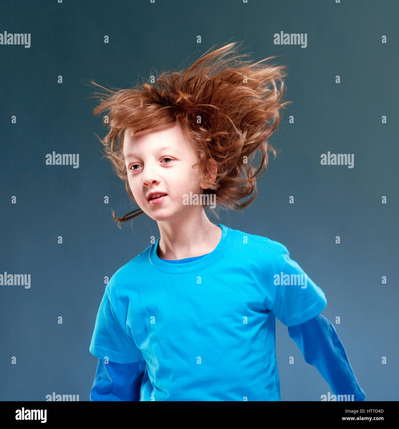 Portrait of a Boy with his Hair Flying in the Air Stock Photo - Alamy