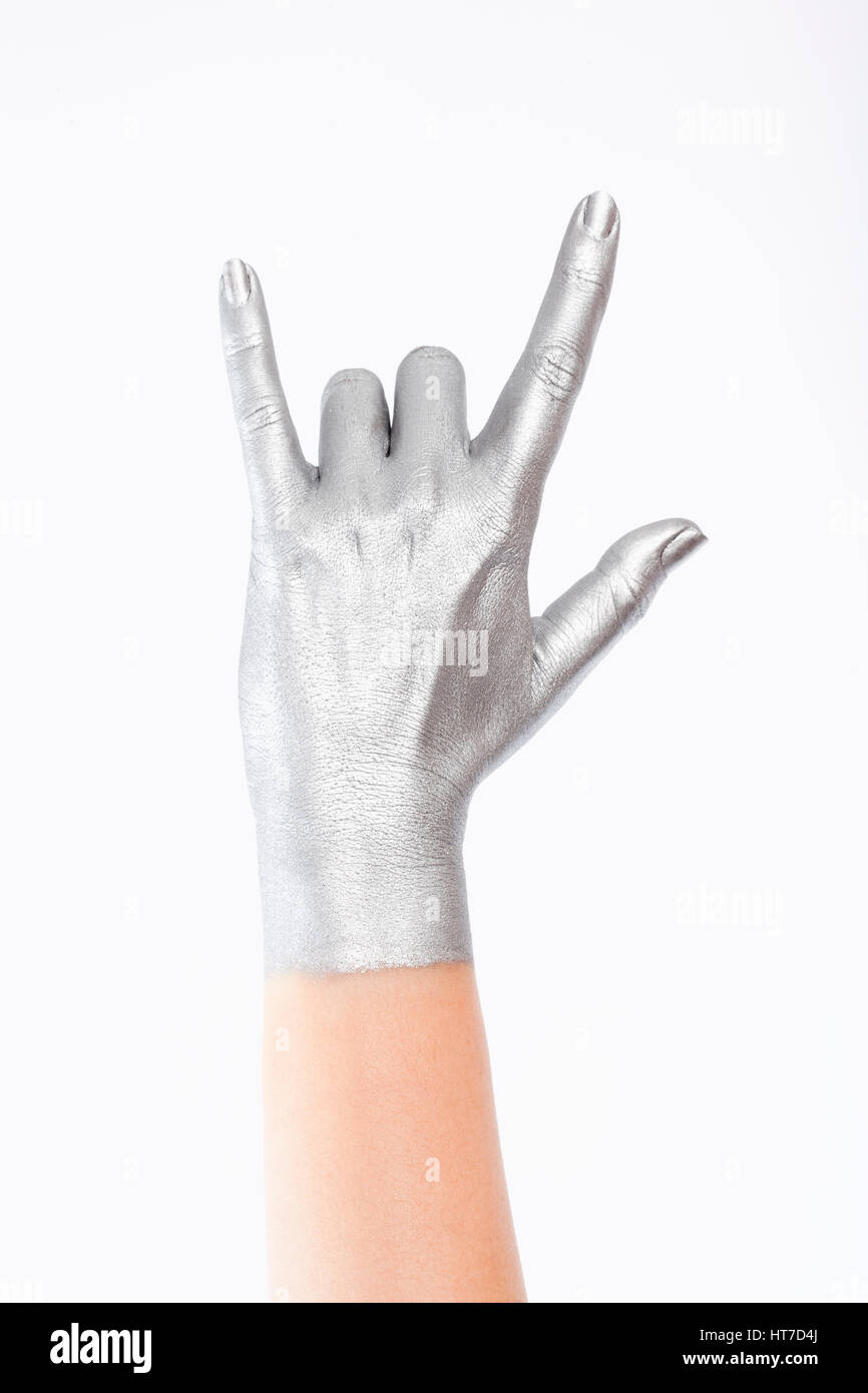 Hand with Silver Colour on Making Gestures Stock Photo - Alamy
