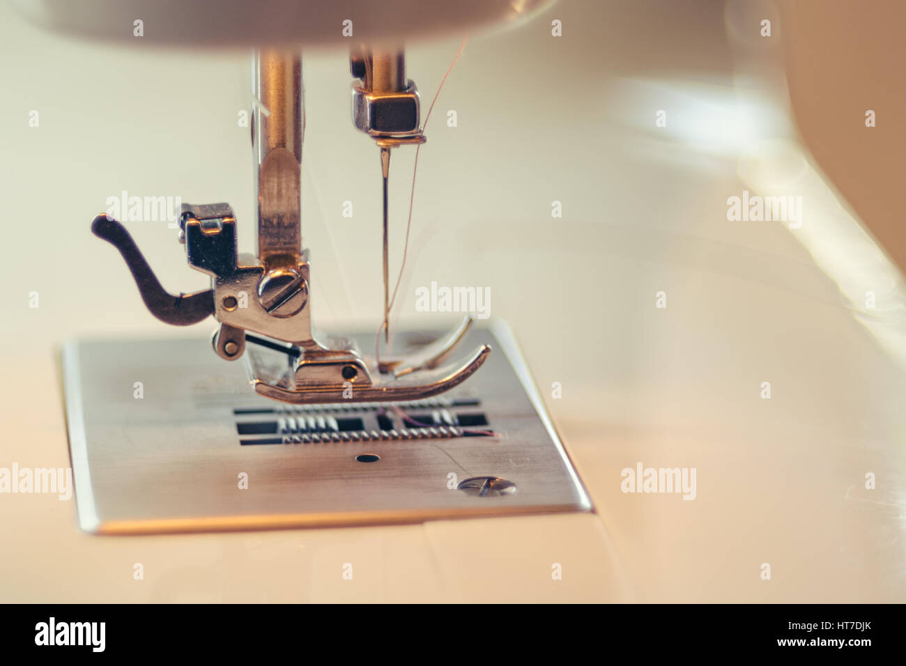 Close-up detail of the Full automatic sewing machine. Background of ...