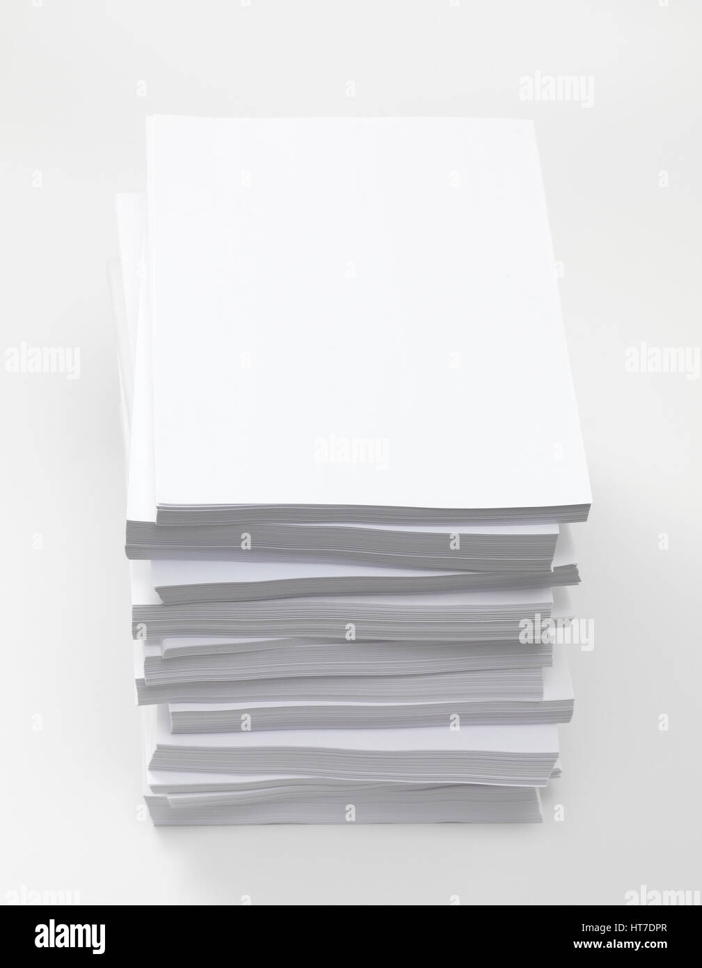 Blank white paper on white Stock Photo - Alamy