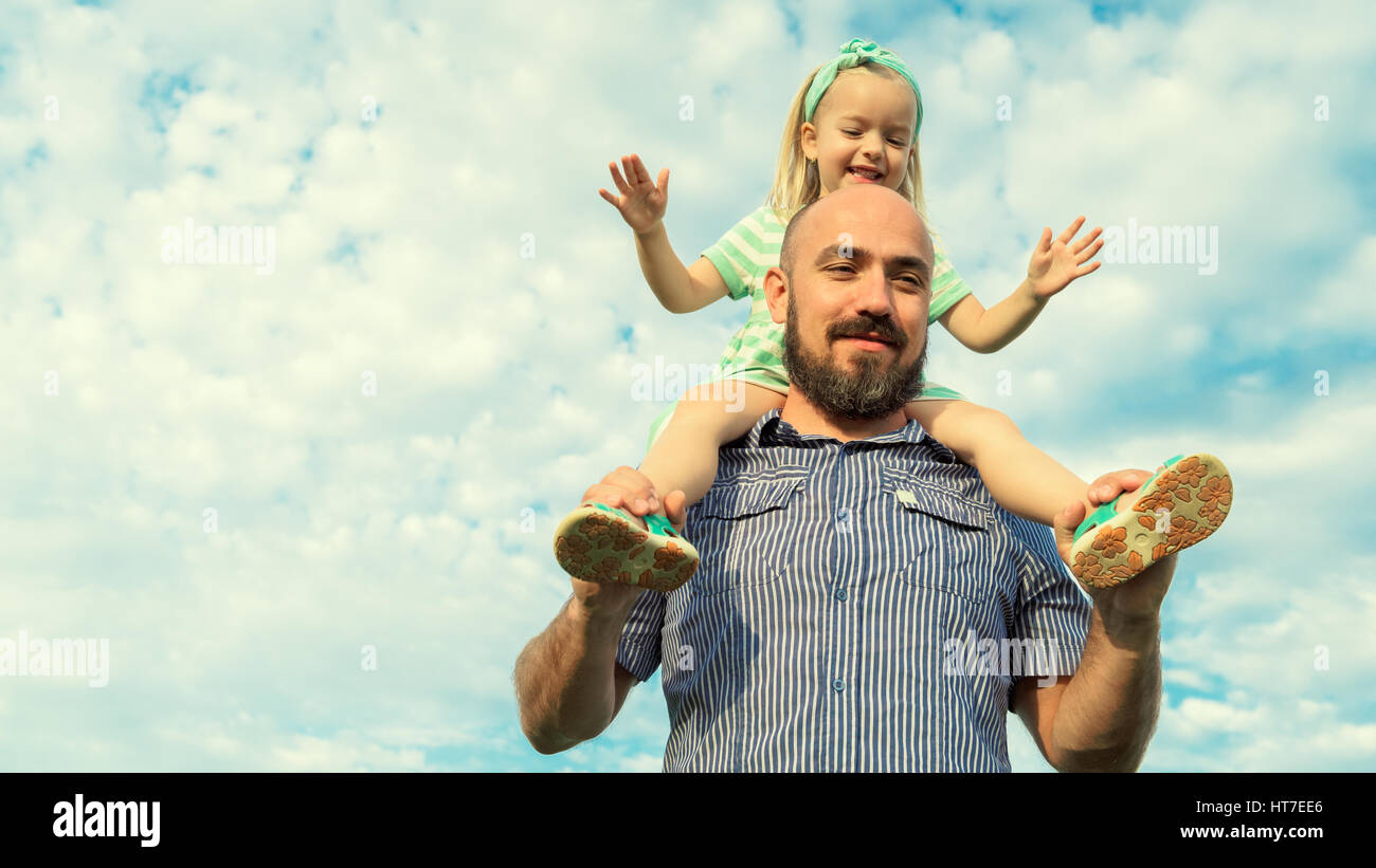 Adorable daughter and father portrait, happy family, future concept ...