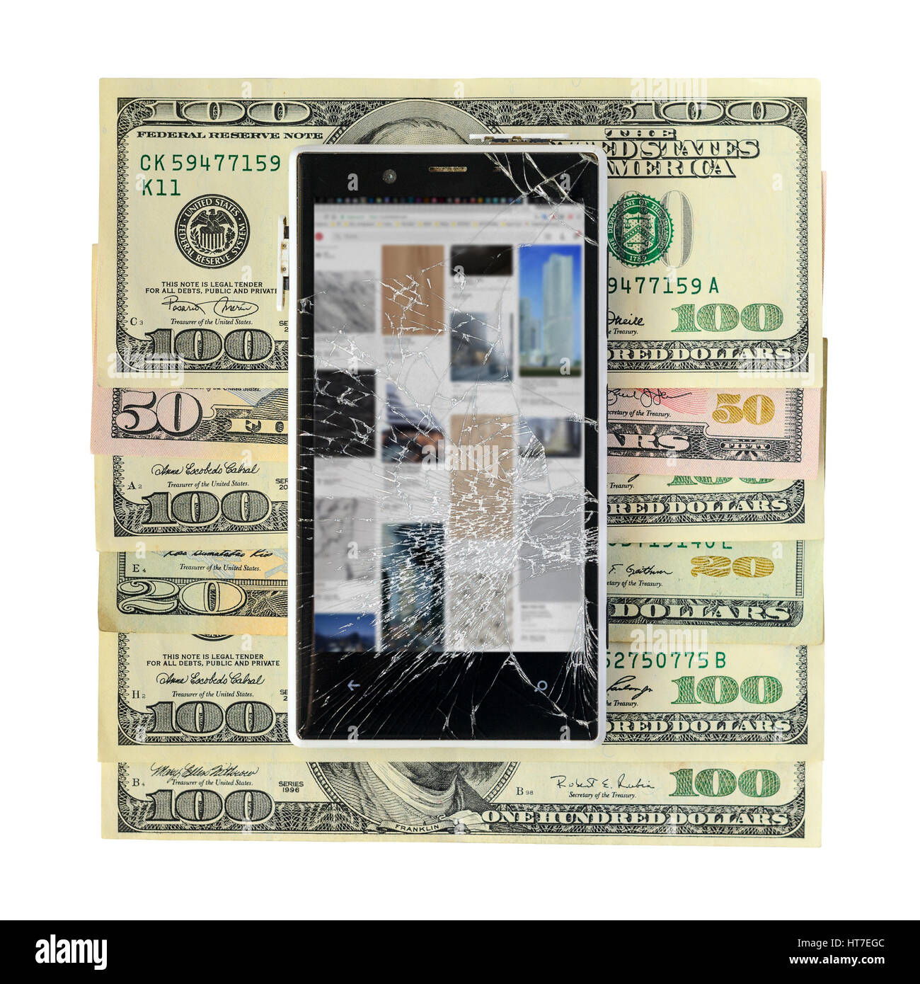 Smartphone with broken display lying on money banknotes Isolated on ...