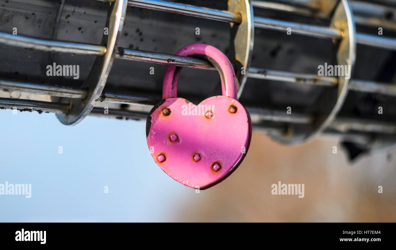 Pink Padlock in the shape of heart Stock Photo - Alamy