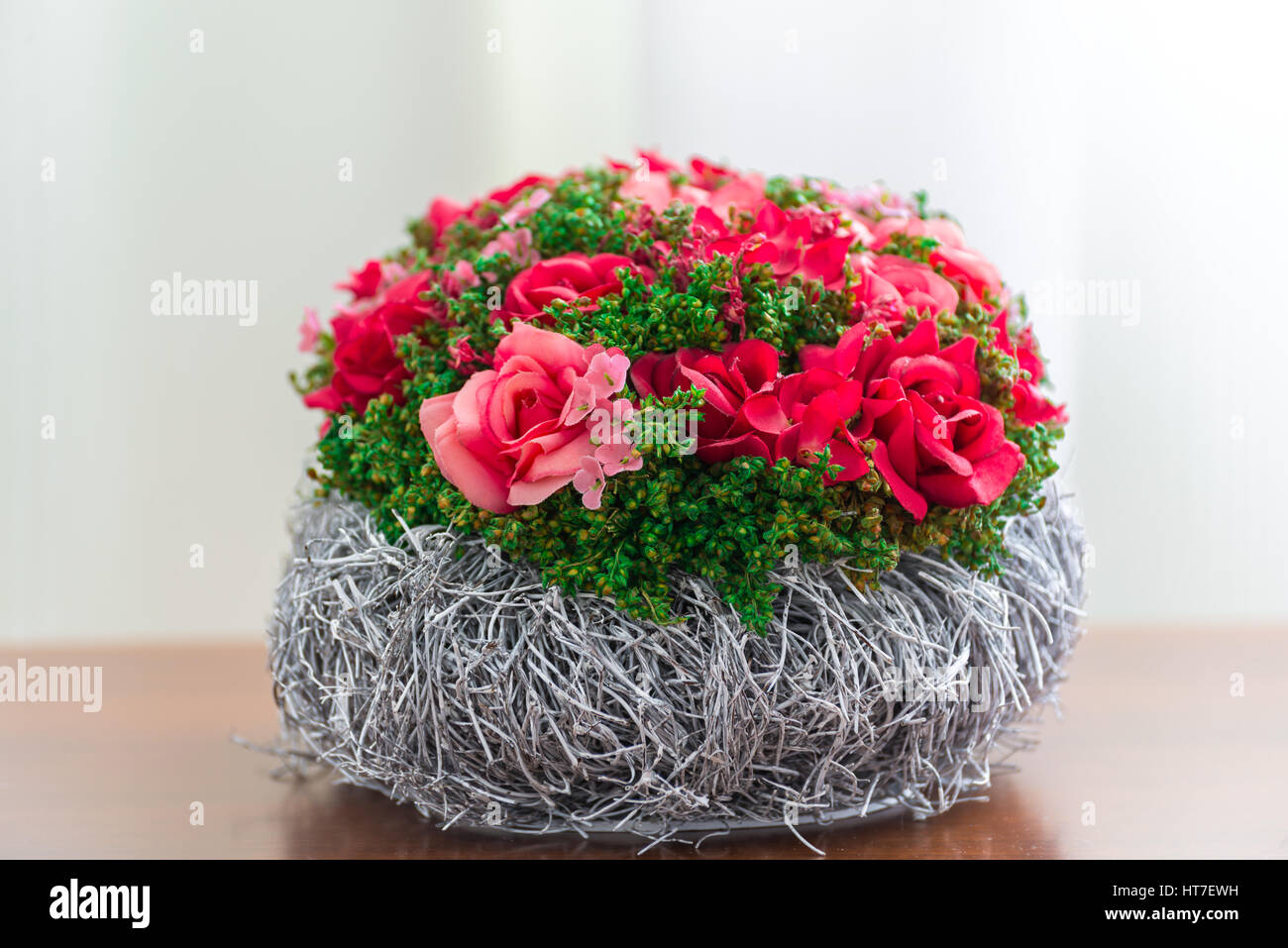 Composition of artificial flowers in the interior Stock Photo - Alamy