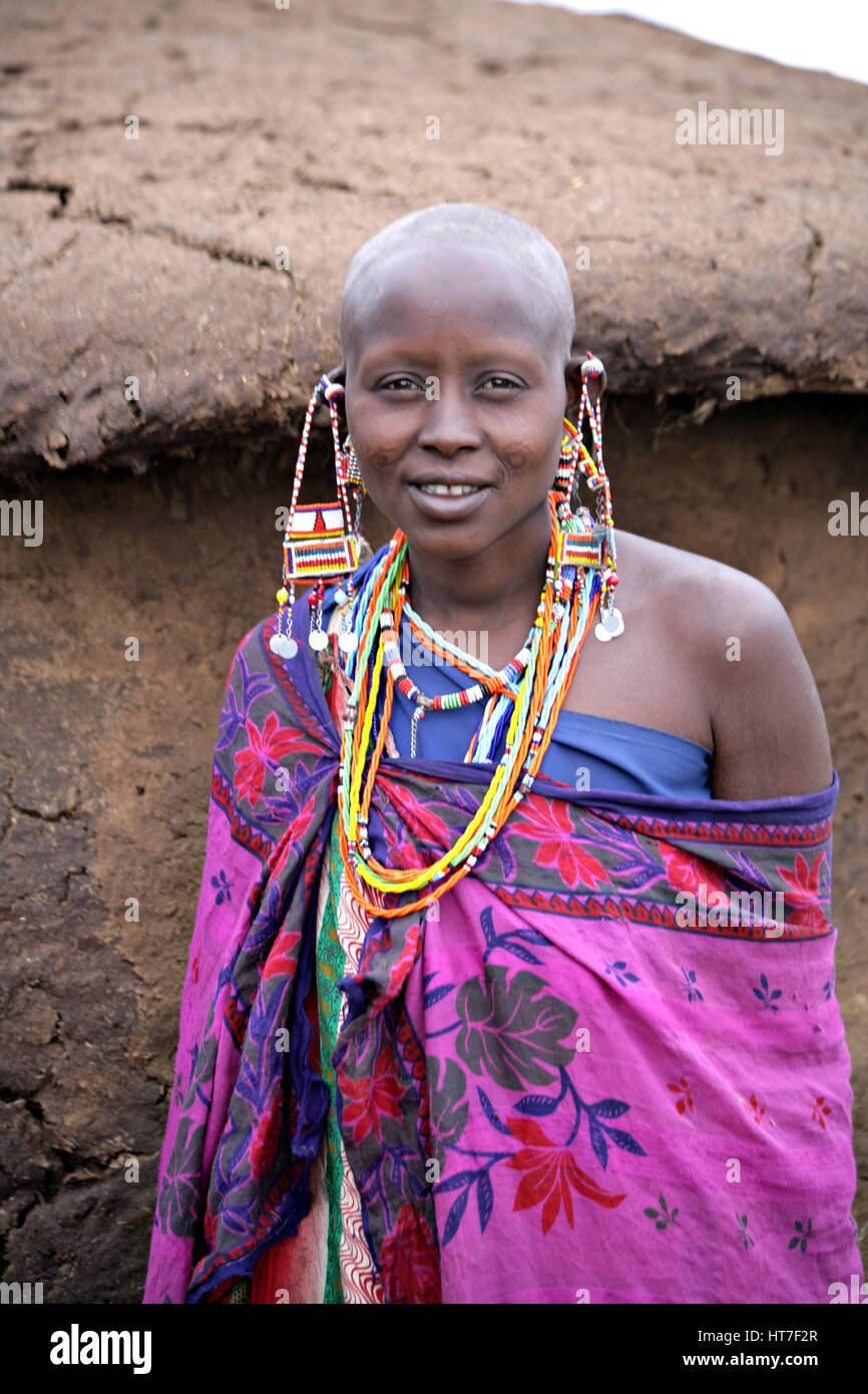 Beautiful Masai woman wearing necklaces and beadwork to denote married ...