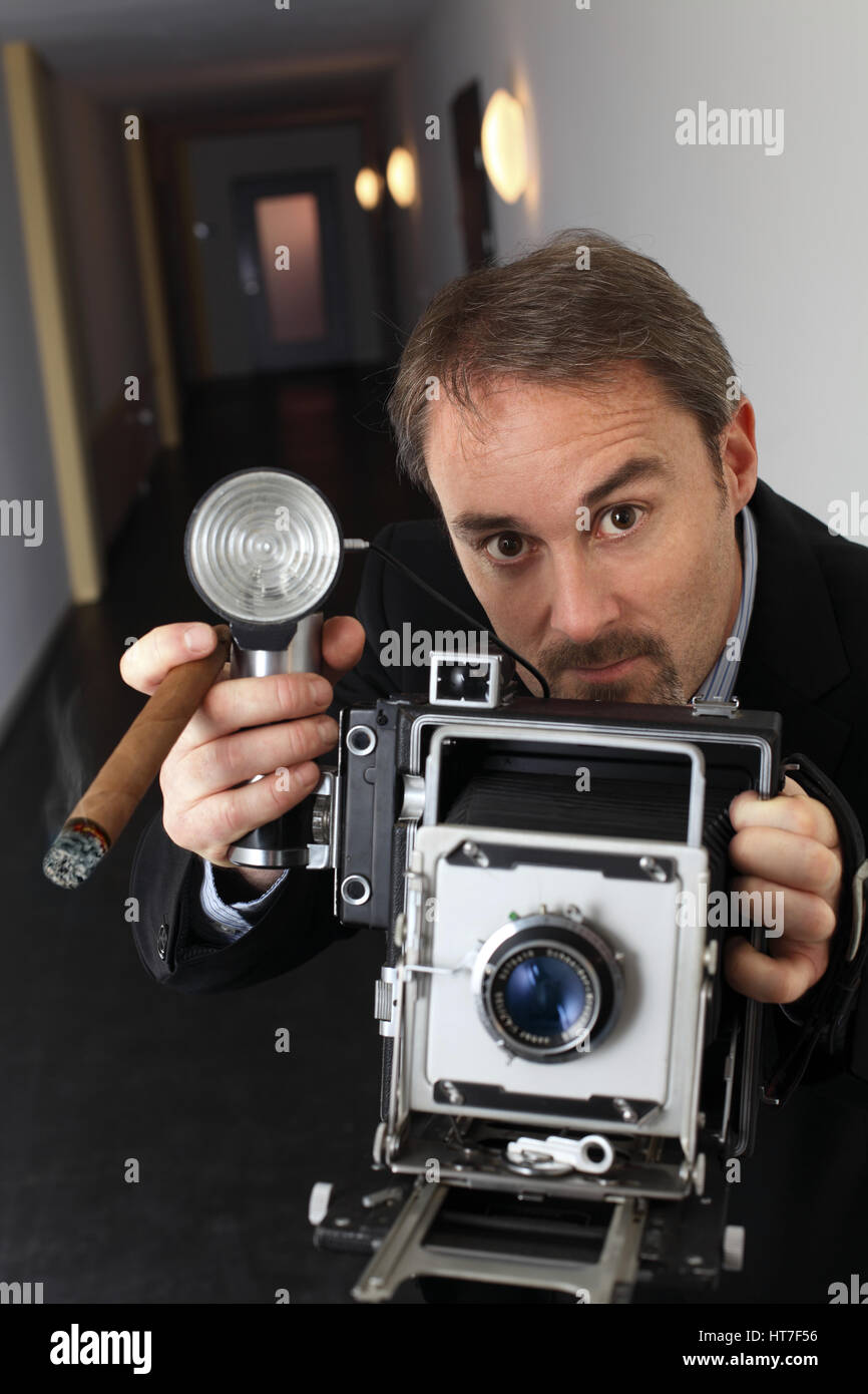 Photo of a retro 1940's style photographer taking a photo with an old ...