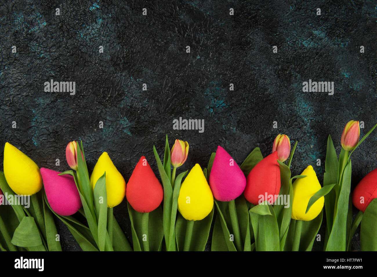 Handmade and real tulips on darken Stock Photo - Alamy