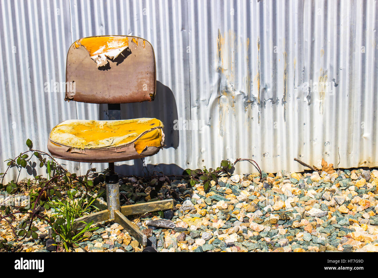 Old Chair Left Outside Building Stock Photo - Alamy