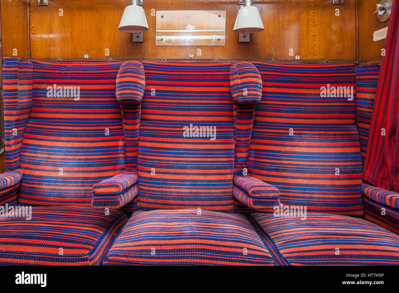 Seating and interior of an old railway carriage compartment on a ...