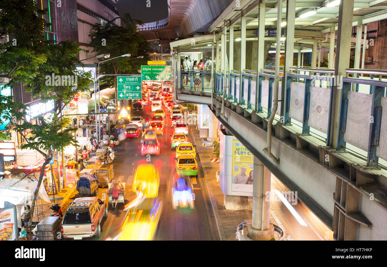 Skytrain and traffic along Silom Road, Bangkok Stock Photo - Alamy