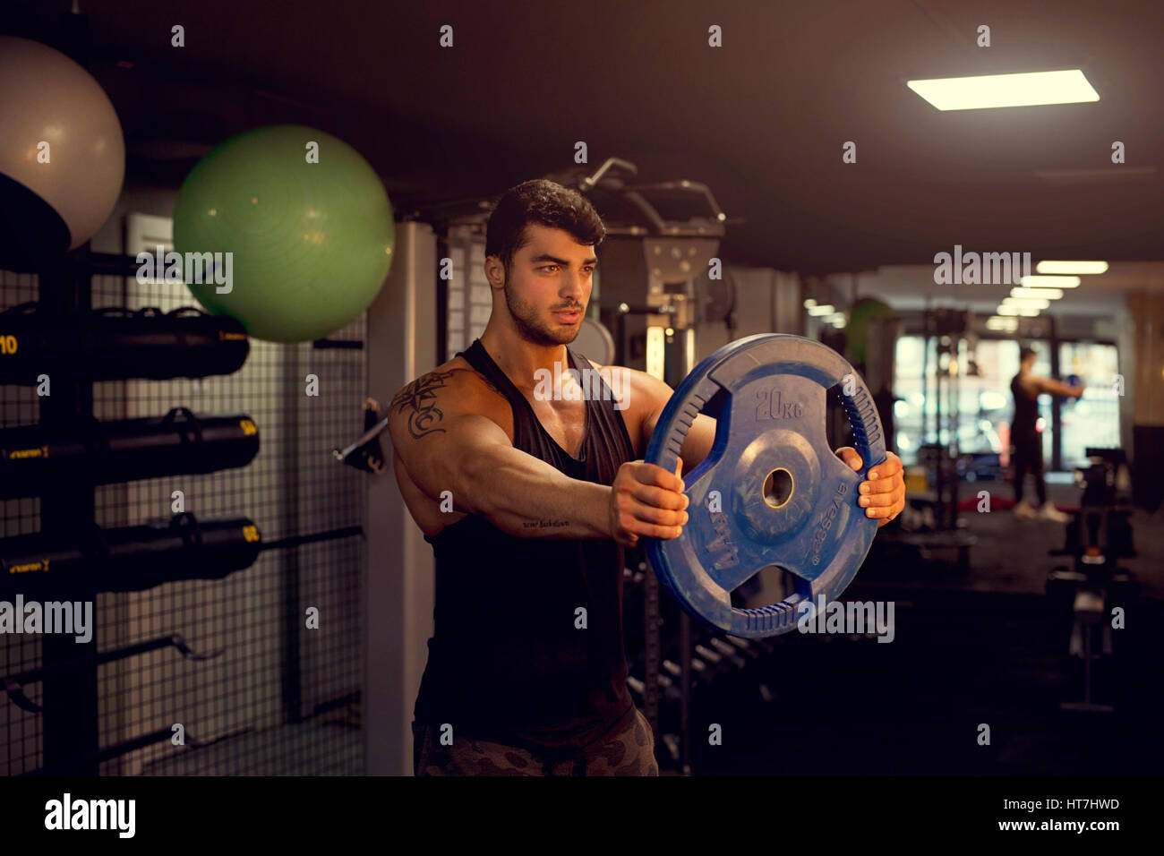 Young Body Builder Training In The Gym Stock Photo - Alamy