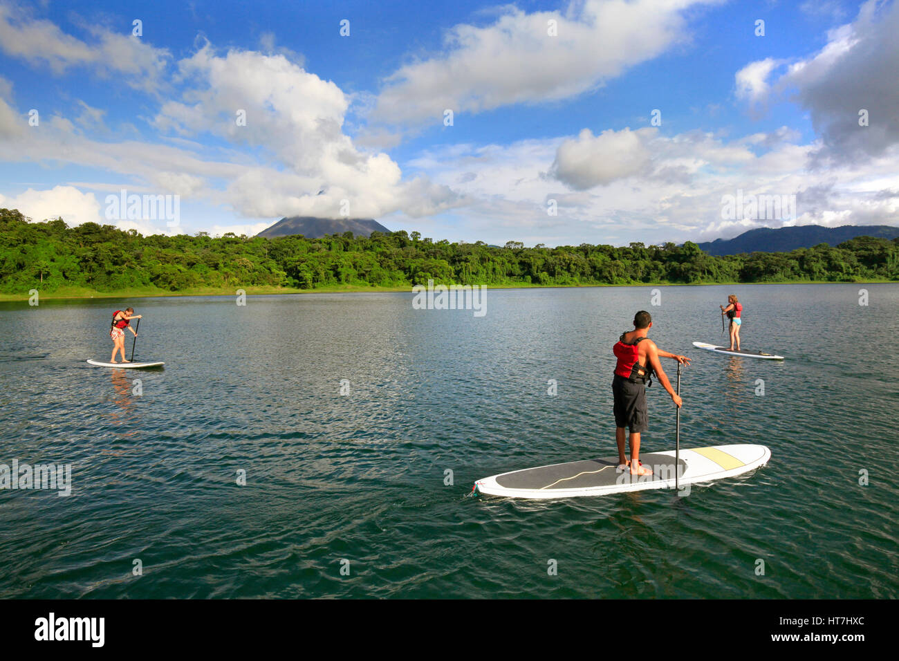 Stand-up Paddleboarding Near La Fortuna With Arenal Volcano In The ...