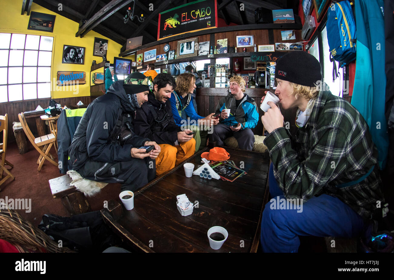 A Group Of Skiers And Snowboarders Inside To A Reggae Bar On The ...