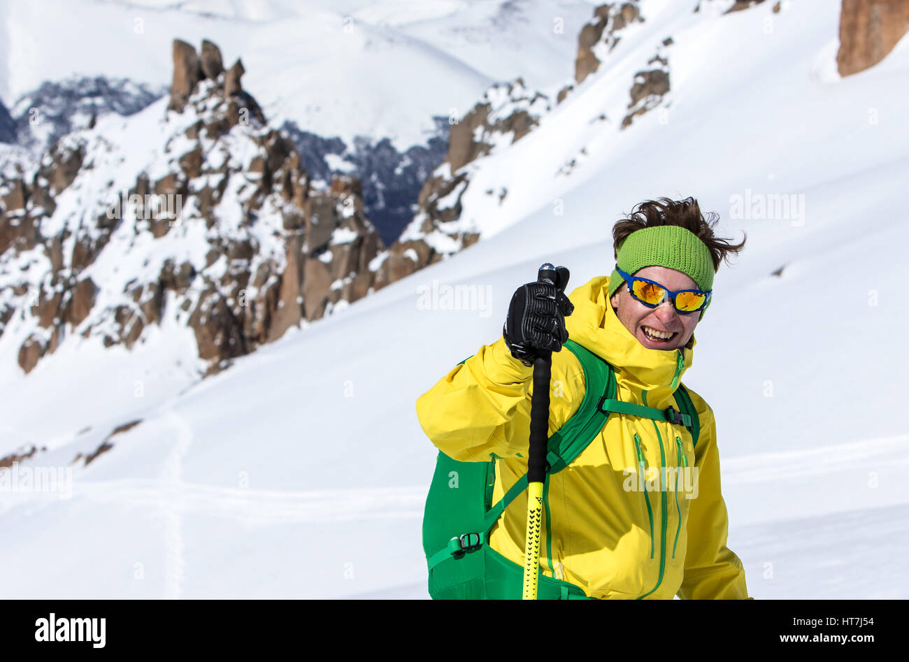 A Smiling Skier Giving Thumbs Up After Having A Fun Run On A Sunny ...