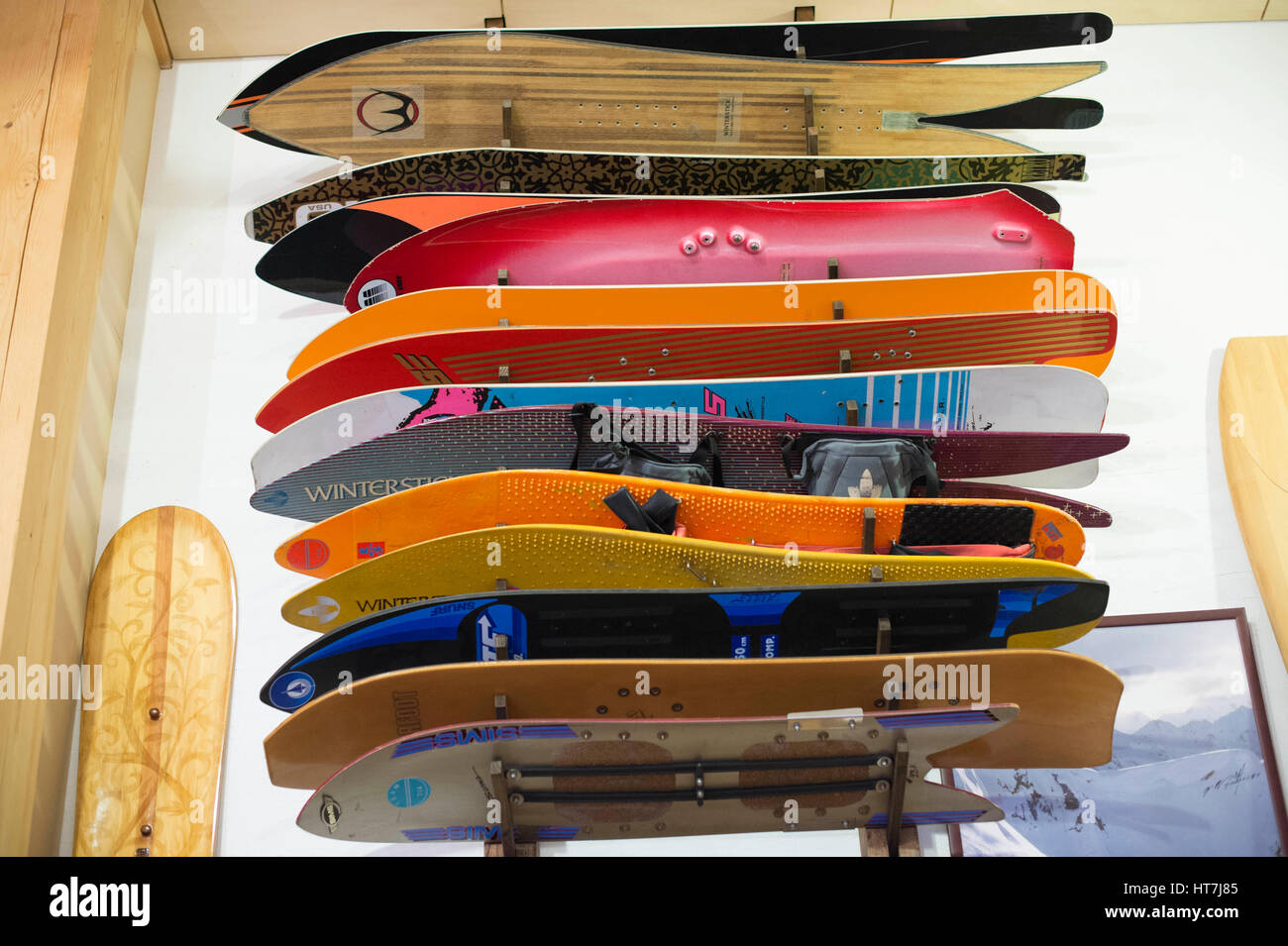 Old snowboards hanging in showroom in niseko hi-res stock photography ...