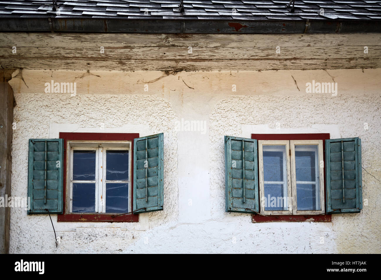 Old windows in antique house building wooden on retro background Stock ...