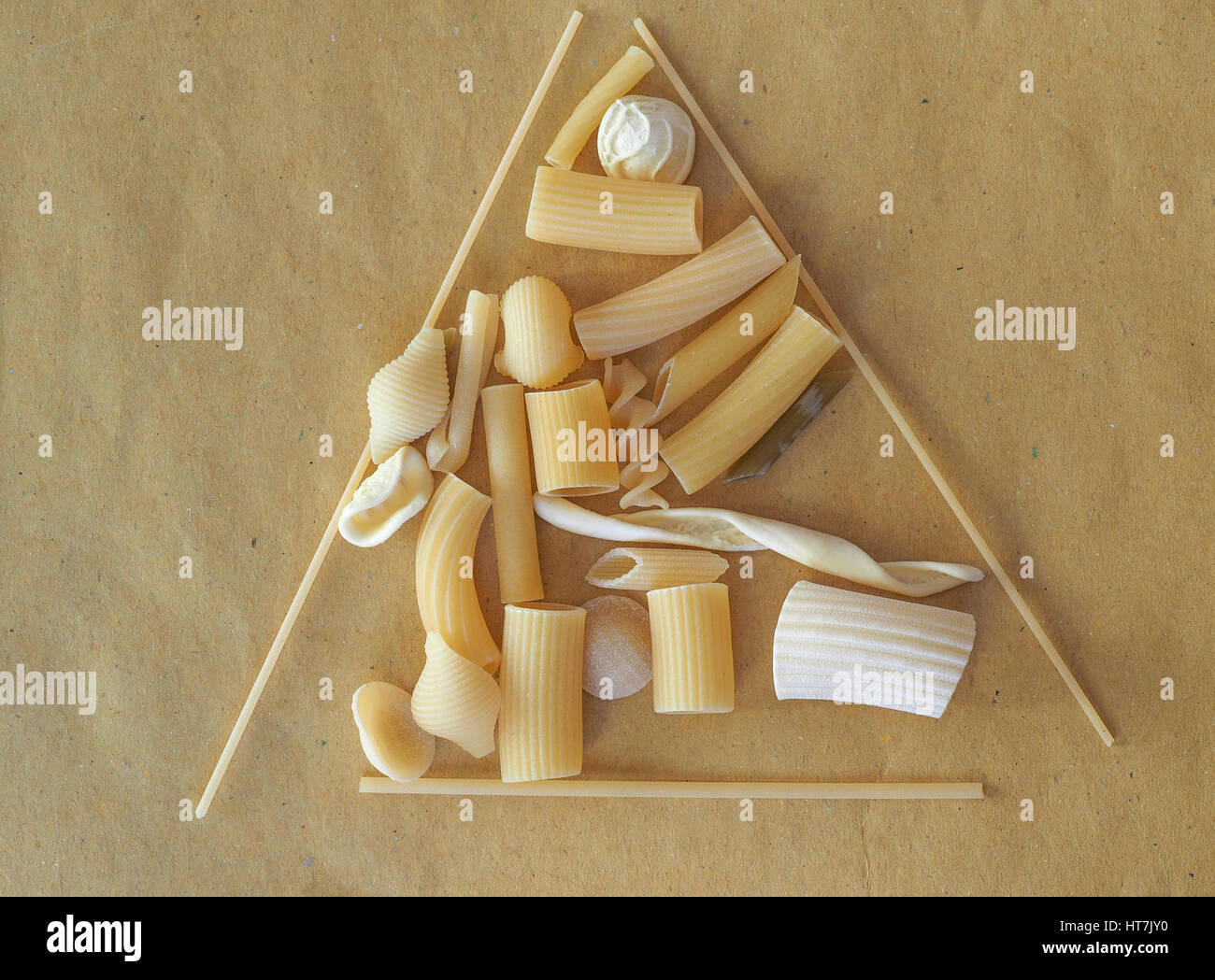 Many different kinds of Italian pasta including penne macaroni ...