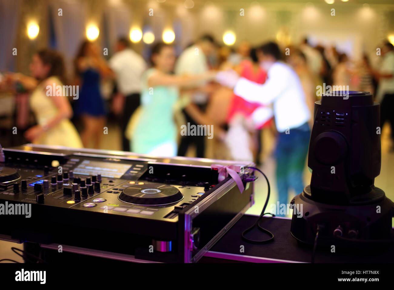 Dancing couples during party or wedding celebration by dj mixer Stock ...