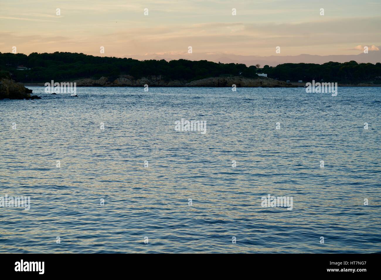 background of an ocean under the evening sky Stock Photo - Alamy