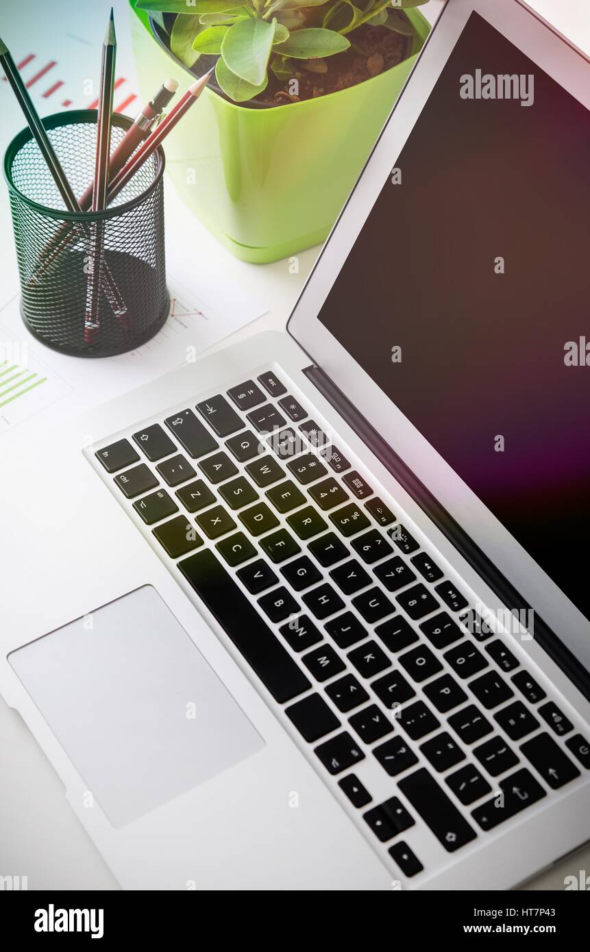 Laptop on desk in modern office mockup. Use for web design presentation ...