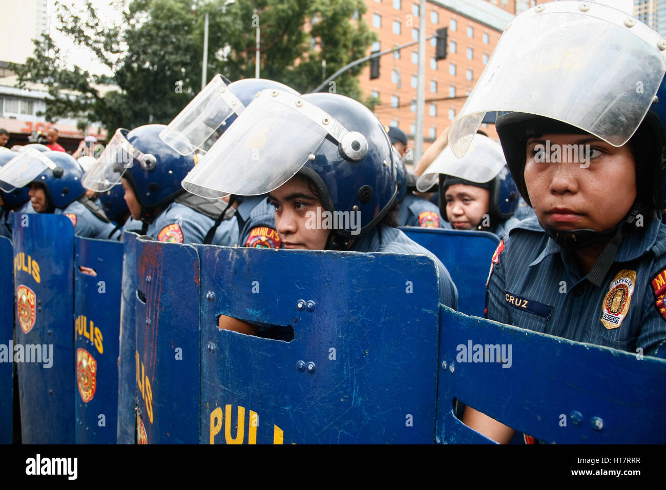 Philippines. 8th Mar, 2017. A platoon of women police officers with ...