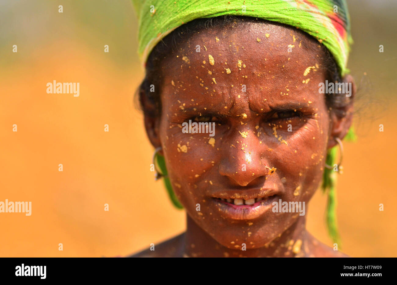 Dimapur, India. 08th Mar, 2017. An Indian woman labour with her face ...