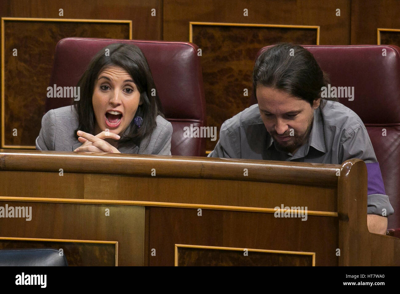 Podemos leader Pablo Iglesias and Podemos spokesperson Irene Montero ...
