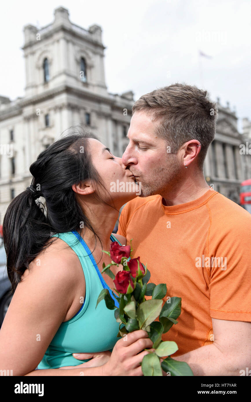 London, UK. 8 March 2017. Tourists Eric Lohela and Elizabeth Wang from ...
