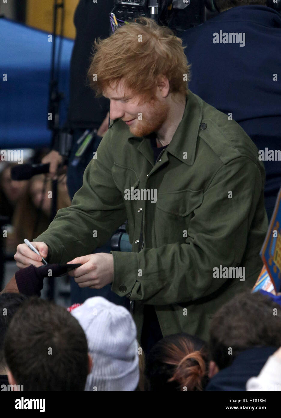 New York, New York, USA. 8th Mar, 2017. Singer ED SHEERAN signs ...