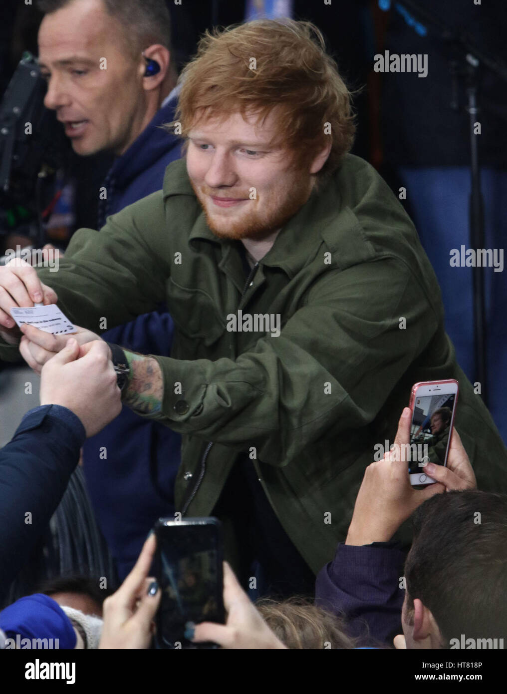 New York, New York, USA. 8th Mar, 2017. Singer ED SHEERAN signs ...