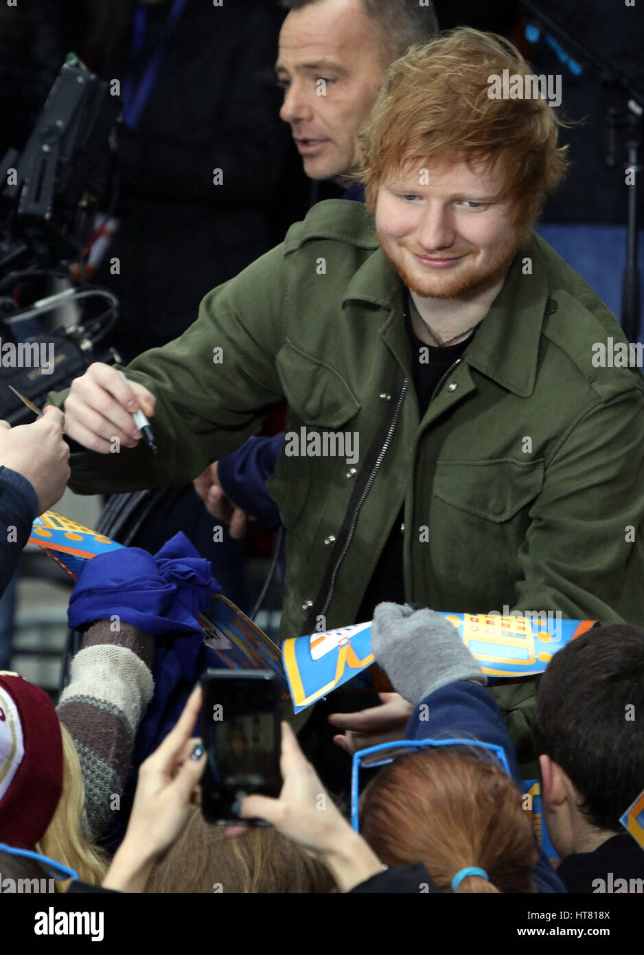 New York, New York, USA. 8th Mar, 2017. Singer ED SHEERAN signs ...