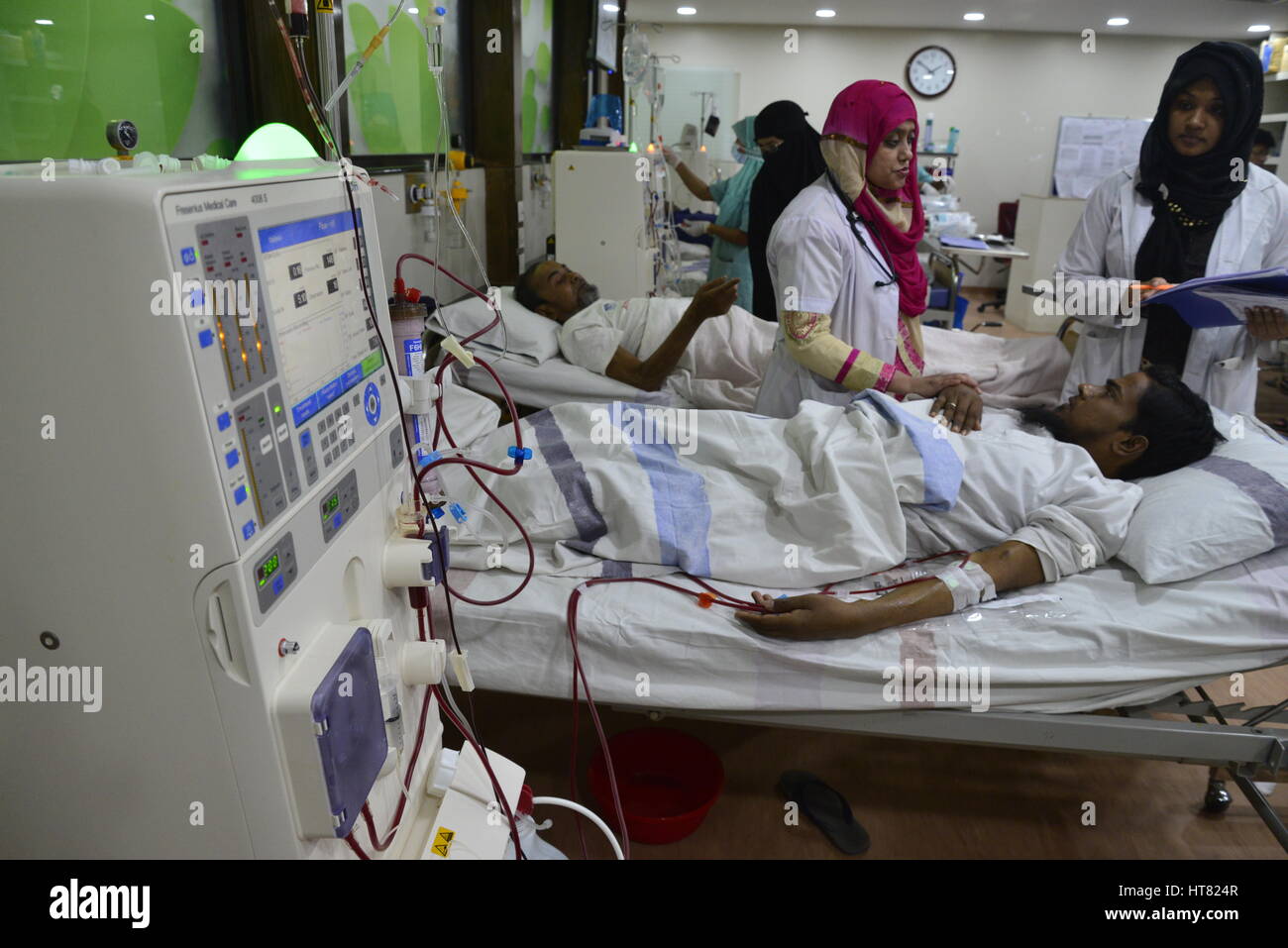 Dhaka, Bangladesh. 8th March 2017. Hospital personnel take care of a ...