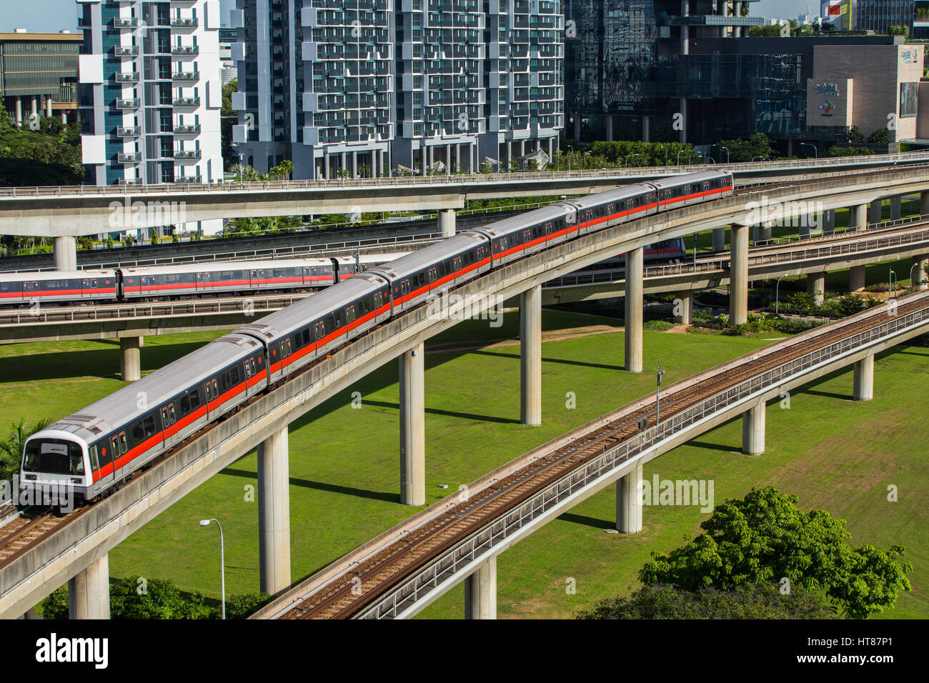 Elevated view of modern trains traveling on railway tracks at Jurong ...