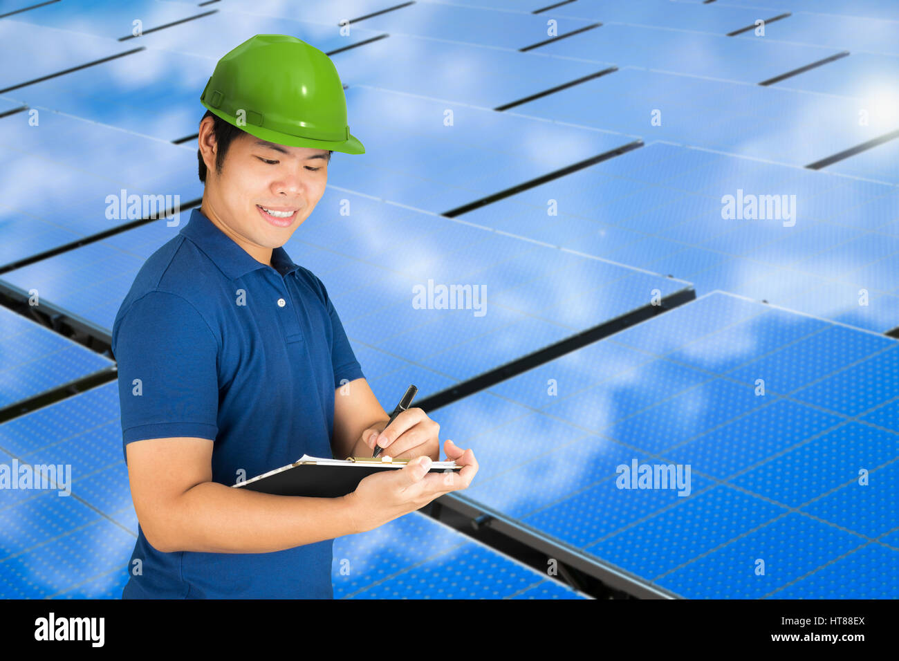solar panel technician with blue solar panel station Stock Photo - Alamy