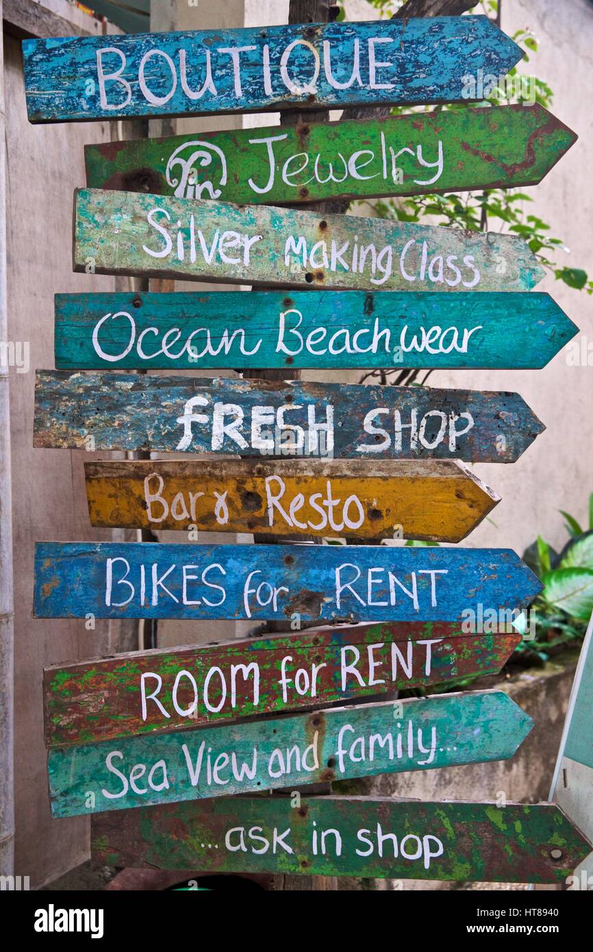 Island wooden handmade directions sign post Stock Photo - Alamy