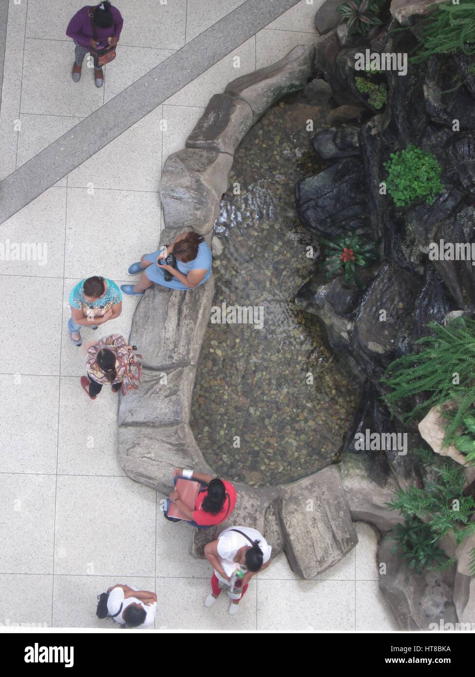 Aerial view people sitting around hi-res stock photography and images ...
