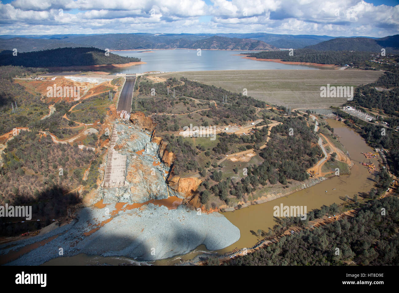 Aerial view showing the damaged spillway and and the huge debris field ...