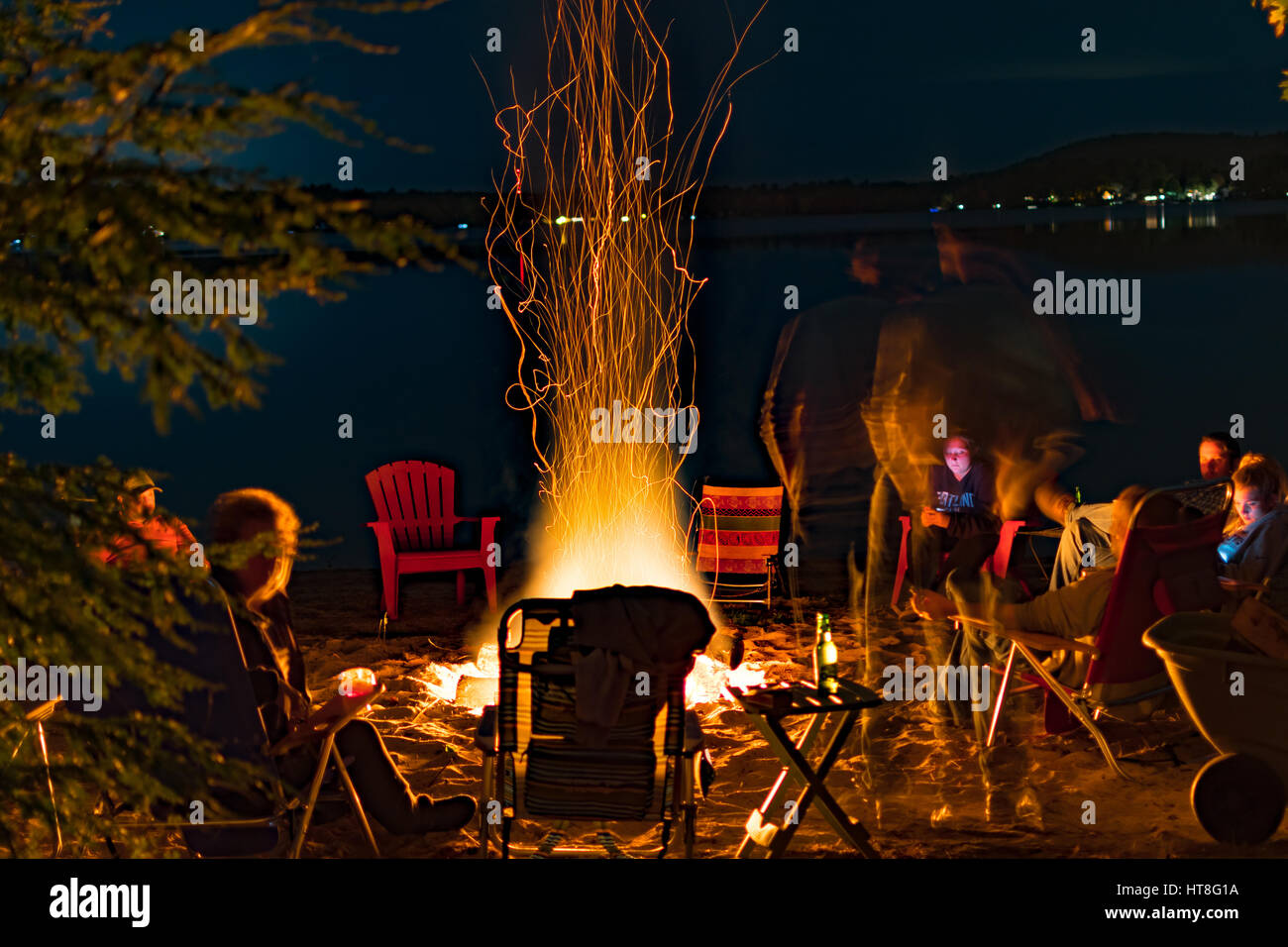 Campfire sparks people beach hi-res stock photography and images - Alamy
