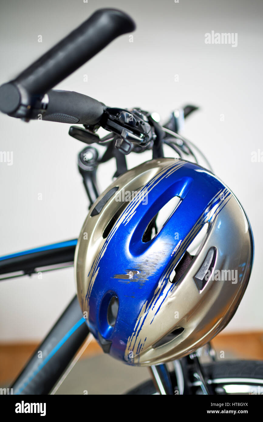 Old Scraped Safety Helmet On The Bike Stock Photo - Alamy
